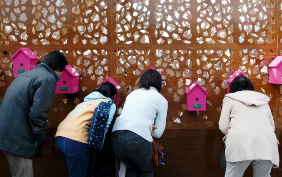 Visitors Peer Through Boxes Having Look Editorial Stock Photo - Stock ...