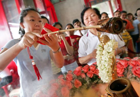 Singaporean Woman Pours Water Over Gold Editorial Stock Photo - Stock ...