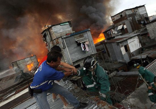 Filipino Residents Pull Fireman On Roof Editorial Stock Photo - Stock ...