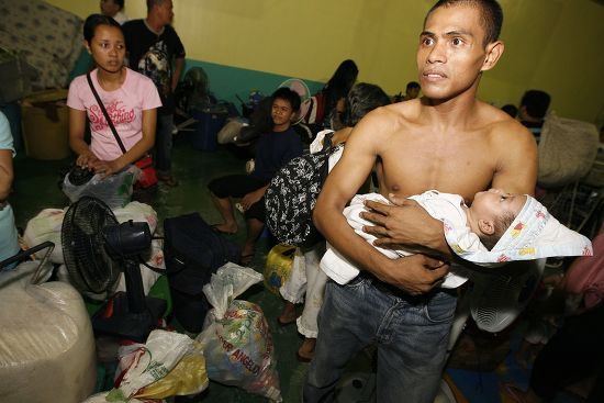 Filipino Resident Holding Baby Seen Inside Editorial Stock Photo ...