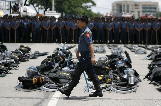 Filipino Police Officer Walks Past Column Editorial Stock Photo - Stock ...