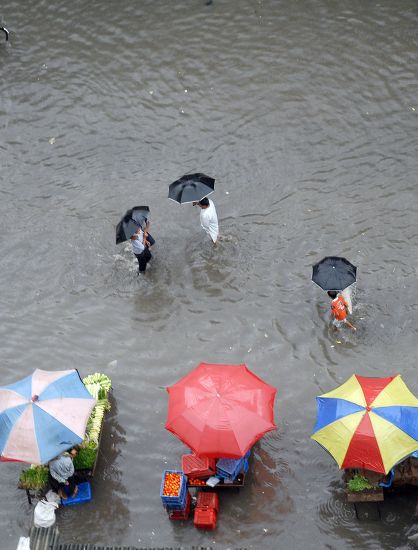 People Wade Through Water Logged Street Editorial Stock Photo - Stock ...