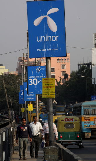 Pedestrians Walk Under Uninor Ads Calcutta Editorial Stock Photo ...