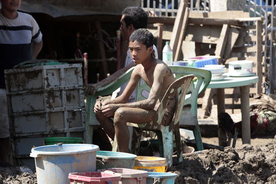 Rafnel Ragcadyo Rests After Clearing Mud Editorial Stock Photo - Stock ...
