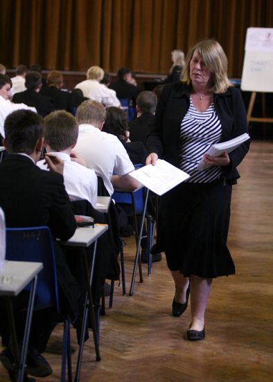 Gcse Examinations Invigilator Hands Out Gcse Editorial Stock Photo ...