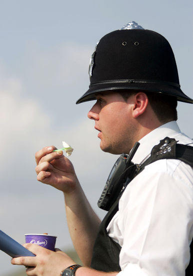 Police Officer Eating Ice Cream Editorial Stock Photo - Stock Image ...