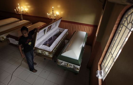 Filipino Funeral Worker Arranges Coffins Hong Editorial Stock Photo ...
