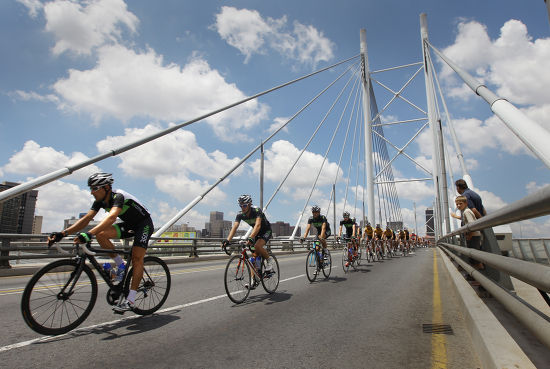 Riders Cross Nelson Mandela Bridge During Editorial Stock Photo - Stock ...