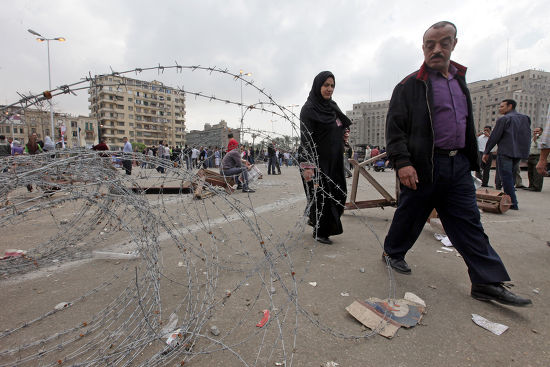 Egyptian Walks Past Barbed Wire Installed Editorial Stock Photo - Stock ...