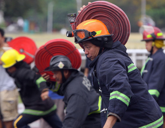 Filipino Firefighters Carry Waterhoses Race During Editorial Stock ...