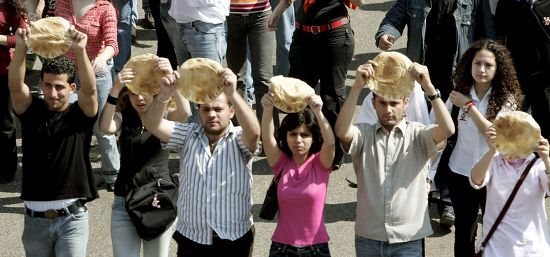 Lebanese Demonstrators Hold Breads During Protest Editorial Stock Photo ...