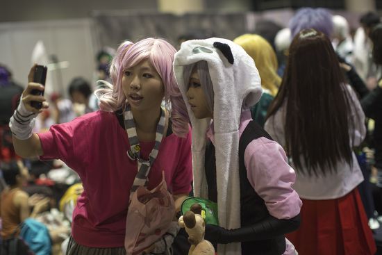 Cosplayers Use Their Mobile Phones During Editorial Stock Photo - Stock ...