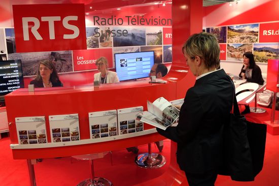 Visitor Reads Brochure Rts Swiss Radio Editorial Stock Photo - Stock ...
