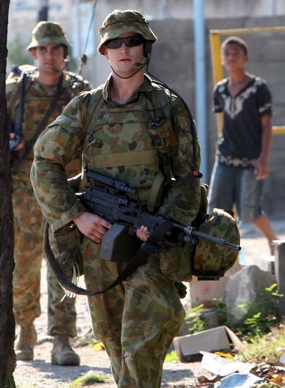 Australian Peacekeeper Soldiers Patrol Along Streets Editorial Stock ...