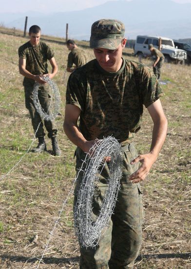 Georgian Soldiers Collect Barbed Wire Near Editorial Stock Photo ...