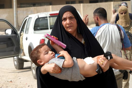 Iraqi Mother Carries Her Child On Editorial Stock Photo - Stock Image ...