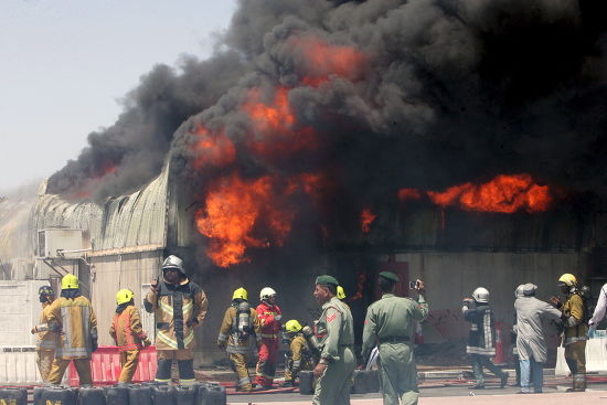 Uae Policemen Gathered Firefighters Try Extinguishe Editorial Stock ...