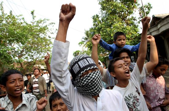 Young Indonesian Muslim Demonstrators Raise Their Editorial Stock Photo ...