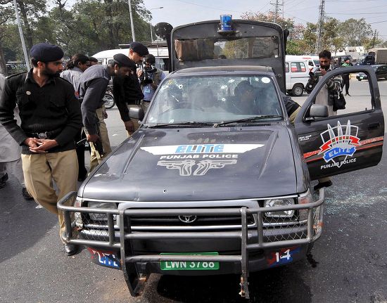 Pakistani Security Officials Inspect Bullet Riddled Editorial Stock ...