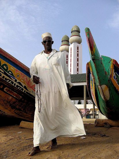 Senegalese Muslim Man Walks On Beach Editorial Stock Photo - Stock ...