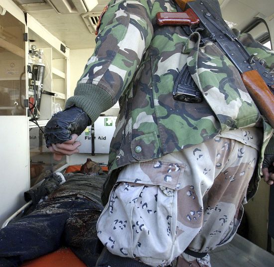 Iraqi Soldier Leans Over Dead Body Editorial Stock Photo - Stock Image ...