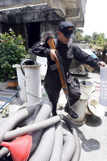 Filipino Police Officer Views Laboratory Equipment Editorial Stock ...