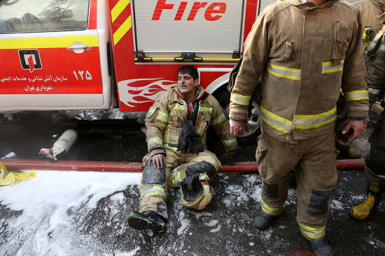 Iranian Firefighter Cries Front Commercial Building Editorial Stock ...