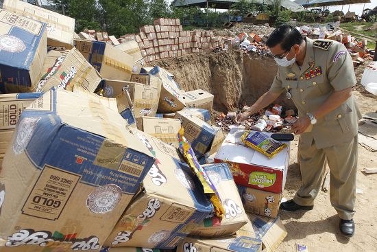 Cambodian Official Inspects Tainted Goods During Editorial Stock Photo ...