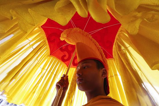 Tibetan Monk Walks Under Holy Umbrella Editorial Stock Photo - Stock ...