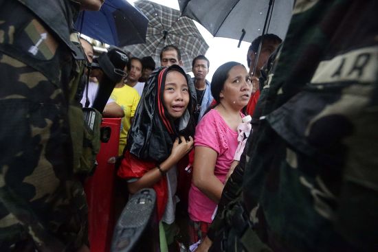 Filipino Residents Held Back By Air Editorial Stock Photo - Stock Image ...