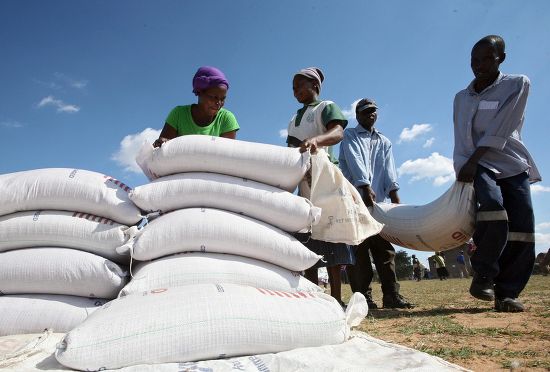 Villagers Help Each Other Carry Bags Editorial Stock Photo - Stock ...
