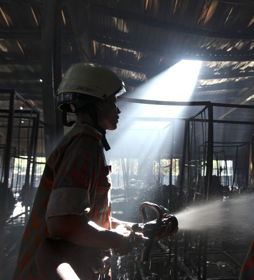 Fire Fighter Hoses Smouldering Remains After Editorial Stock Photo ...