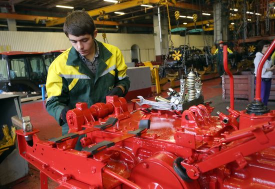 Worker Assembles Parts Tractor Assembly Line Editorial Stock Photo ...