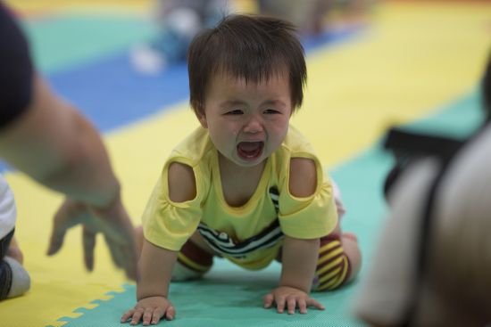 Child Crawls On Mat During Baby Editorial Stock Photo - Stock Image ...