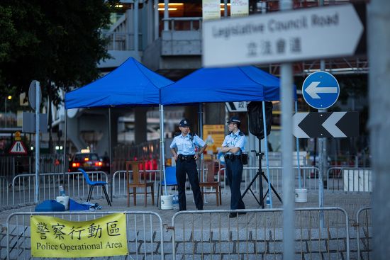Police Stand Guard By Roundabout Outside Editorial Stock Photo - Stock ...