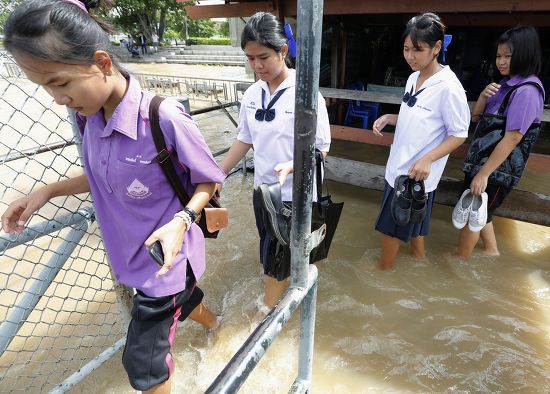 Thai Students Wade Through Floodwaters On Editorial Stock Photo - Stock ...