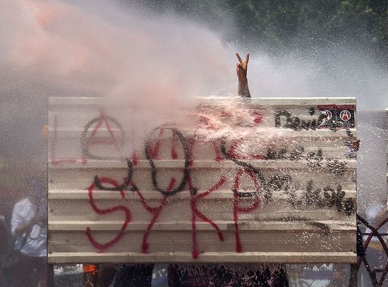 Protestor Makes V Sign Behind Barrier Editorial Stock Photo - Stock ...