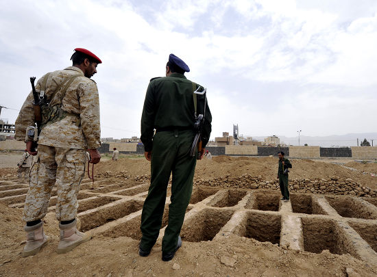 Yemeni Soldiers Stand Over Graves Ahead Editorial Stock Photo - Stock ...