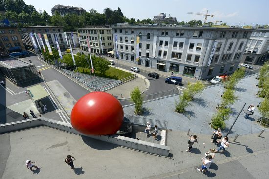 People Walk Past Huge Red Ball Editorial Stock Photo - Stock Image ...