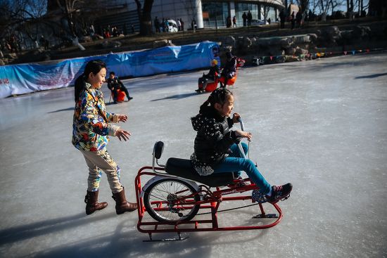 Chinese Girl Rides Ice Bicycle On Editorial Stock Photo - Stock Image ...