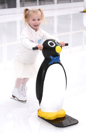 Child Using Penguin Aid Skating Editorial Stock Photo - Stock Image ...