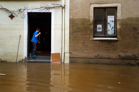 Boy Sweeps Water House Into Still Editorial Stock Photo - Stock Image ...