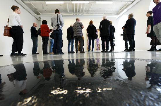 Group Stands Behind Work Puddle By Editorial Stock Photo - Stock Image ...