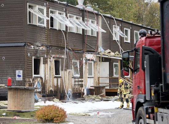 Swedish Firefighters Inspect Scene After Extinguishing Editorial Stock ...