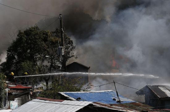 Filipino Firefighters Direct Their Hoses Toward Editorial Stock Photo ...