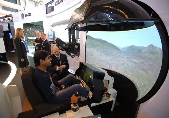 Visitors Use Flight Simulator Exhibition Stall Editorial Stock Photo ...