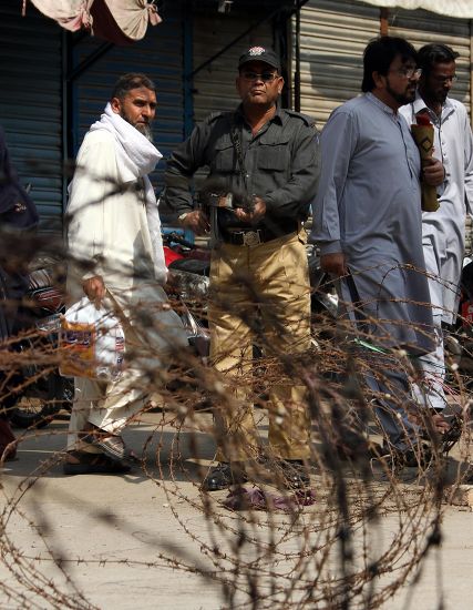 Pakistani Security Official Stands Guard Outside Editorial Stock Photo ...