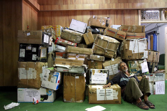Indian Labourer Takes Rest Near Boxes Editorial Stock Photo - Stock ...