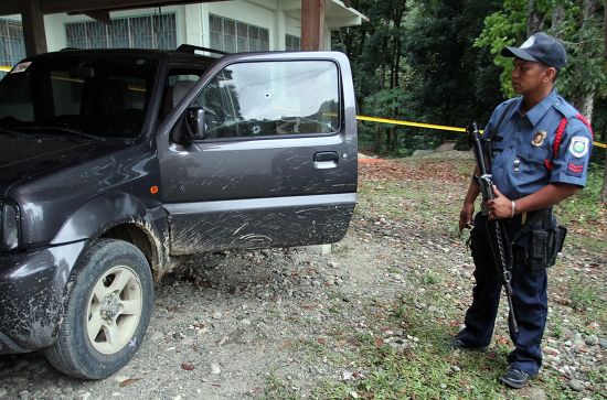 Philippine Police Officer Keeps Watch On Editorial Stock Photo - Stock ...
