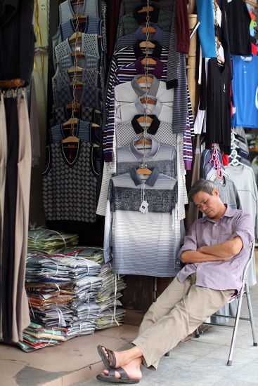 Man Selling Clothes Takes Nap Outside Editorial Stock Photo - Stock ...
